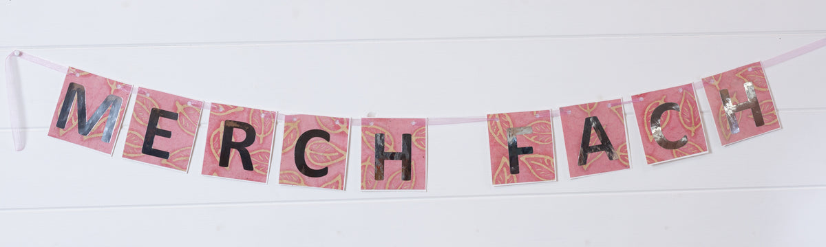 Merch Fach Banner – Anglesey Paper Company